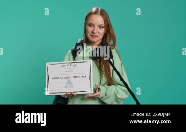 Happy student holding diploma talking in microphone, addressing ...