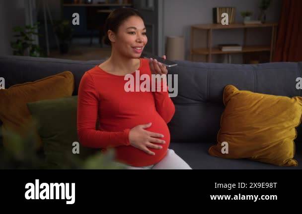 Happy African American ethnic smiling pregnant woman pregnancy belly ...