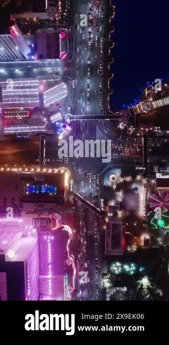 Vertical Screen: Experience the vibrant urban life of Las Vegas at night with its dazzling ...