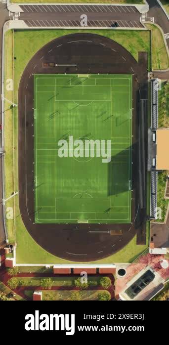 Vertical Screen: A captivating aerial view of a football field with a ...