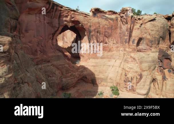 An aerial image of Gemini Bridges, approaching the arch at mid-level ...