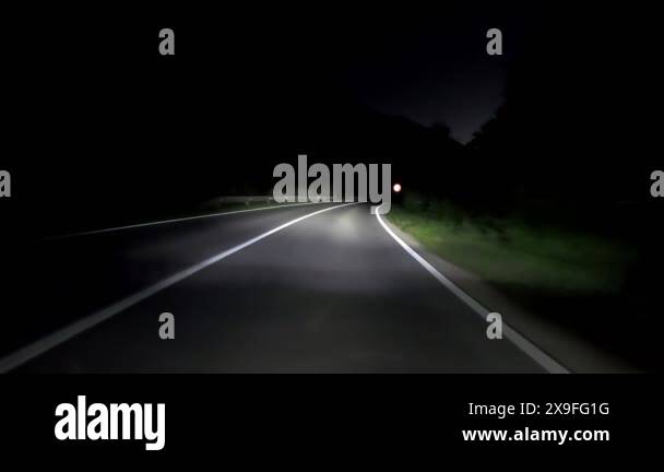 driving a car on a countryside road at night with adaptive matrix LED ...