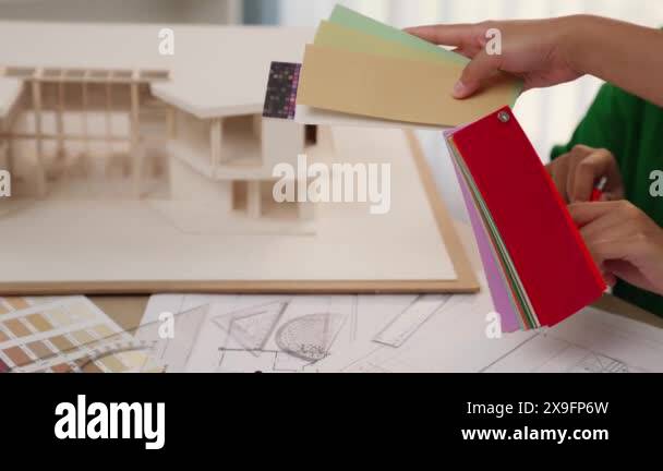 Slow motion interior designer using architectural equipment draw a ...