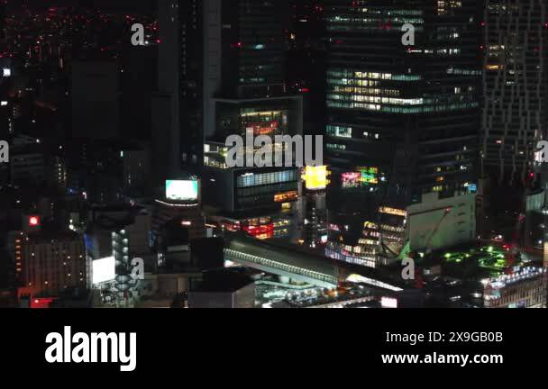 Elevated view of modern buildings in urban borough at night. High rise ...