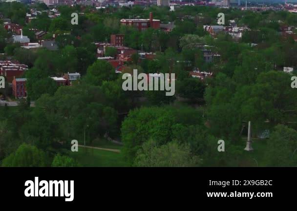 Reveal arerial shot of St. Louis skyline with the iconic gateway arch ...