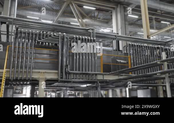 Refinery factory inside. Modern equipment, steel pipelines for chemical ...