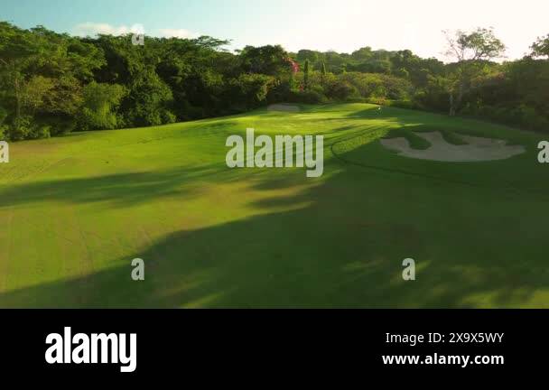 Background video of an aerial view of a country golf club with green ...