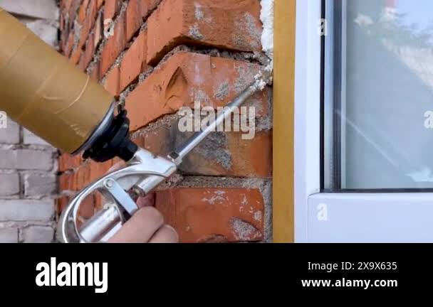 Installation of a window. The process of insulating windows with ...