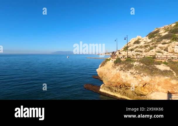 RINCON DE LA VICTORIA, SPAIN - FEBRUARY 21, 2024: Morning walking on ...