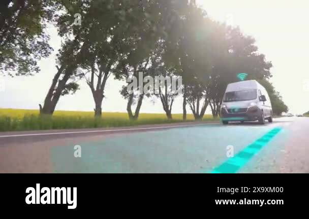 A white minibus delivers parcels. Smart delivery of goods. Smart ...