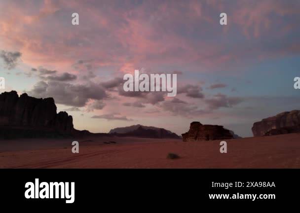Breathtaking sunset paints the sky with pastels over Jabal Al Qattar ...