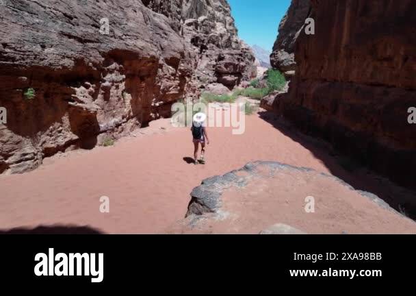 Lone woman treks through the breathtaking Abu Khashaba or Burrah canyon ...