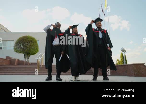 Group happy graduates throwing graduation Stock Videos & Footage - HD ...