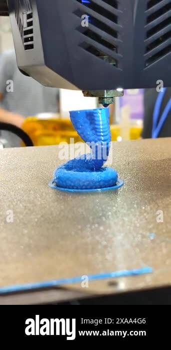 Process of printing object on 3D printer from molten plastic. 3D ...