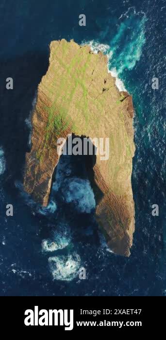 Vertical Screen: Breathtaking aerial view of a unique rock formation in ...