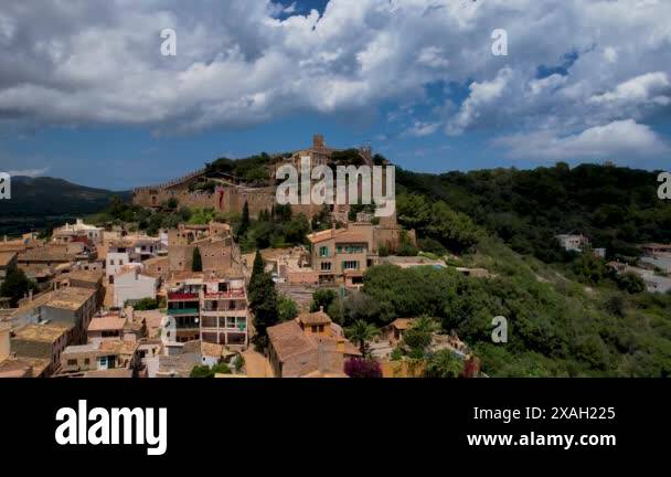 4K Aerial Drone video of beautiful terracotta color town with a massive ...