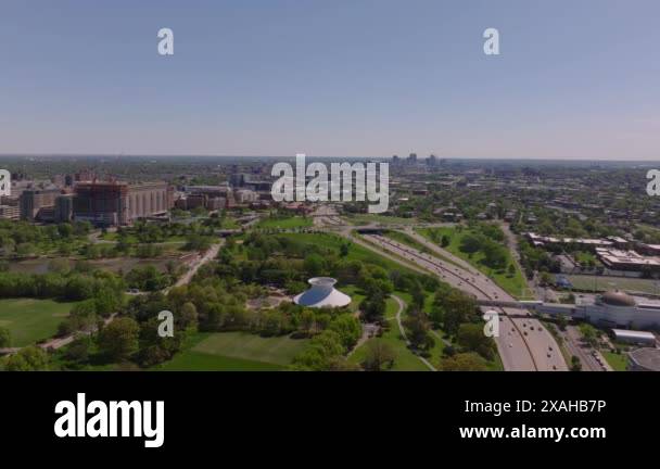 Dynamic aerial view showcasing the lush green parks, iconic buildings ...