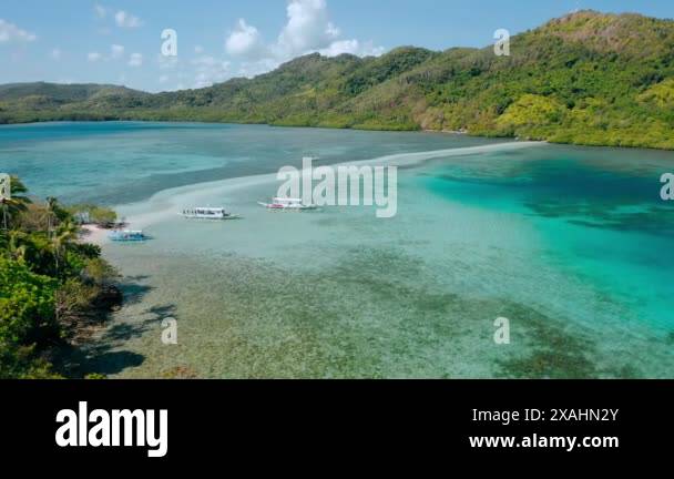 Sandbar near Snake Island with turquoise coastal shallow ocean water ...