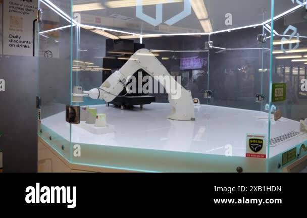 Warsaw, Poland - May 03, 2024 In innovative robotic coffee shop robotic ...