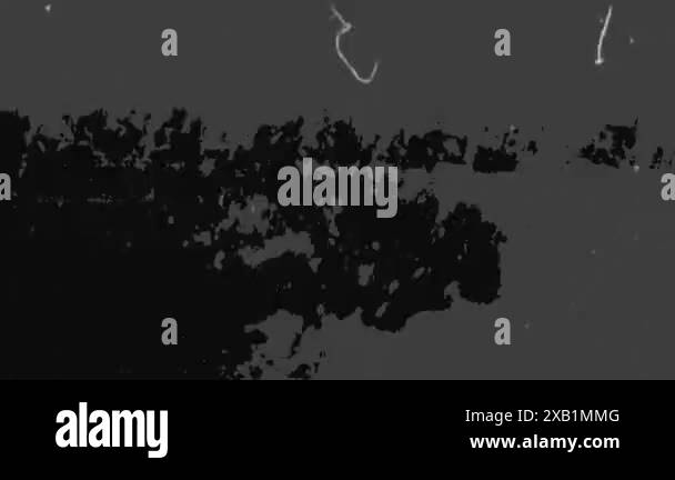 old damaged VHS tape playing, over noise from an analog TV, random ...