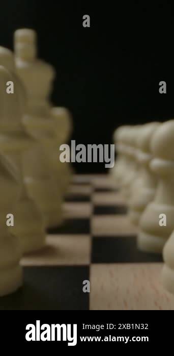 White chess pieces in start row position ready to game concept. Wide ...