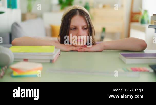 Sad and worried young student feels terrified by the extensive learning ...