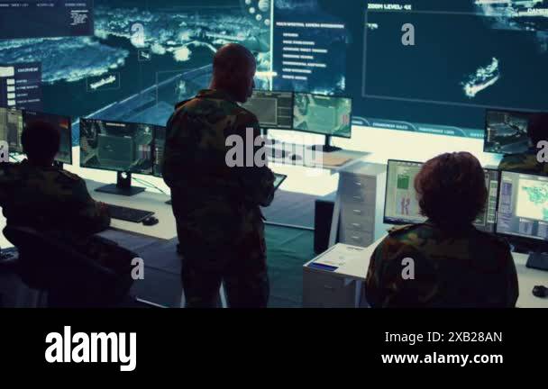 Commander and his crew operating radar systems via CCTV and satellite ...