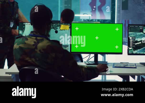 Control room operator tracking all ships anchoring along the coast line ...