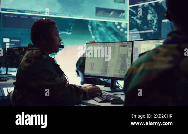 Female army operator registers important information from military ...