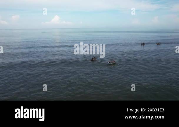 Fishing boats anchored off Ladghar beach at Dapoli, located 200 kms ...