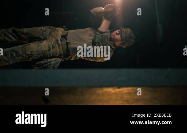 vertical video at professional shooting range military weapons trainer ...