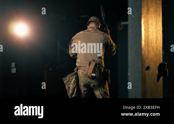 at professional shooting range military weapons trainer standing ...