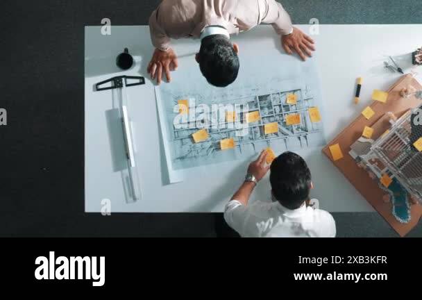 Time lapse of smart architect engineer writing building structure idea ...