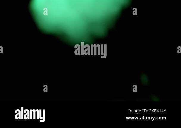 Explosion of Green Smoke or Vapor on Black Blurred Background. Abstract ...