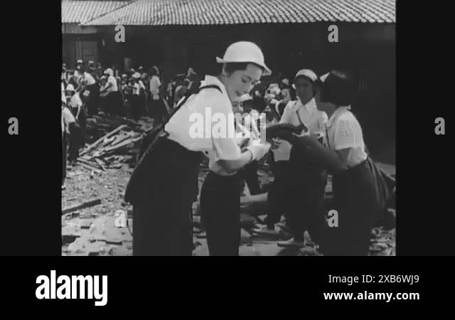JAPAN - 1953 - In this war film, the atomic bomb is dropped in Hiroshima as students are helping ...