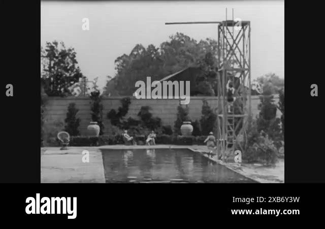 US - 1944 - in this silent comedy, a man gets ready to dive into a pool ...