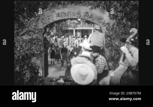 US - 1944 - in this western, a horse-drawn cart goes in circles around ...