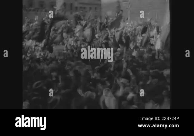 ROME - 1935 - Benito Mussolini begins a speech to an excited crowd at ...