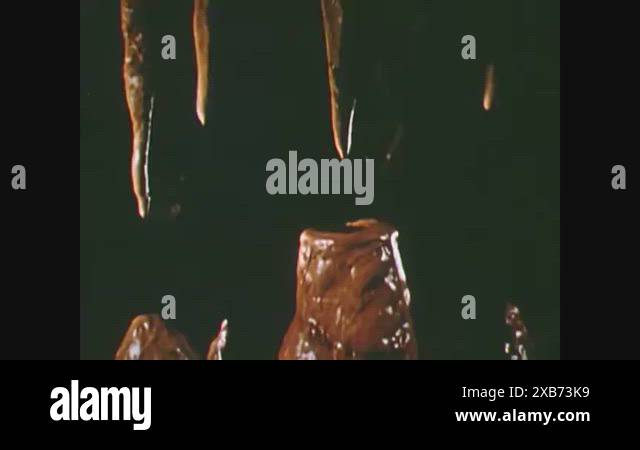 USA - 1951 - The formation of stalagmites, stalactites, and rock ...