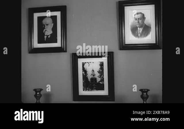 1920s - A portrait of American President Wilson hangs next to one of ...