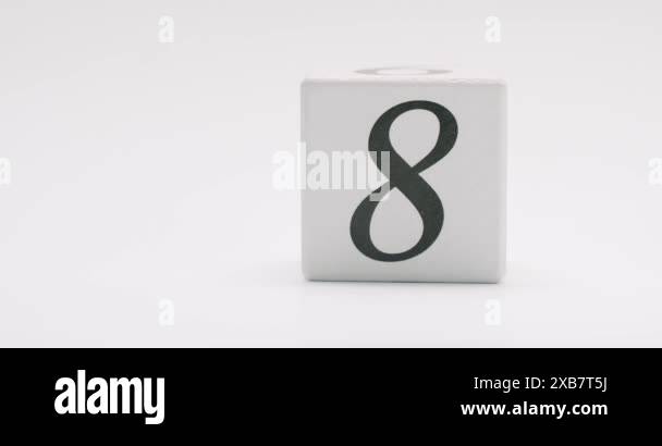 Minimalistic white block displaying the number eight on a plain white ...