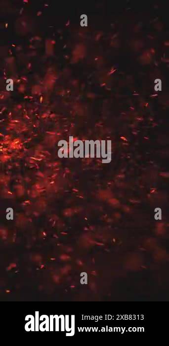 Vertical video - burning red hot sparks and embers fire background ...