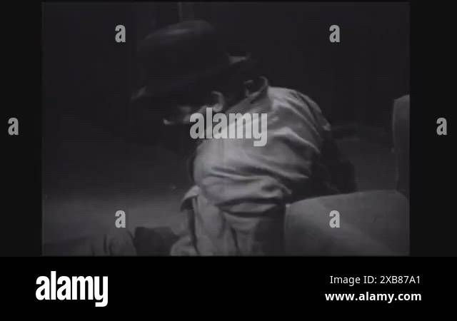 1937 - In this western film, a Chinese man holds a tied up white cowboy ...