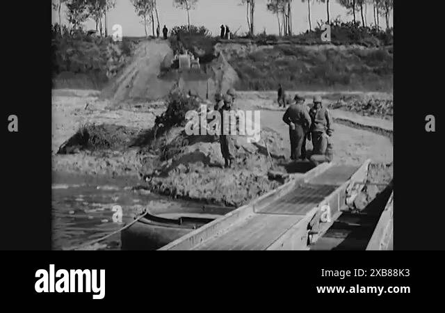 1945 - Generals Crittenberg, Hays and Crane cross a pontoon bridge over ...