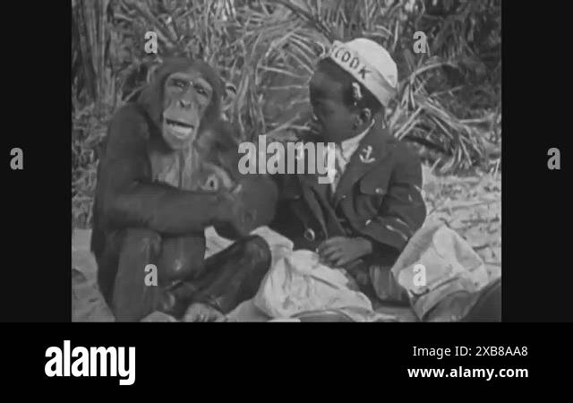 1926 - In this silent comedy, a chimpanzee tickles a boy on the beach ...