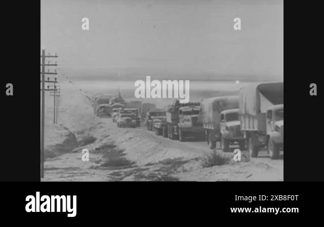 1965 - A US Navy seaman in dive gear is hoisted aboard the USS Braine ...
