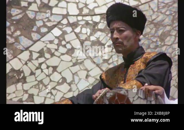 1969 - In this adventure film, a group of people are watching a dam ...
