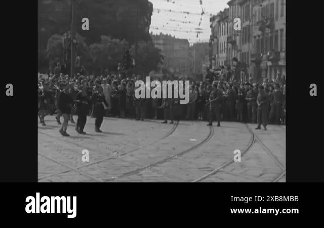 1945 - Italian partisans in the resistance movement pass in review ...