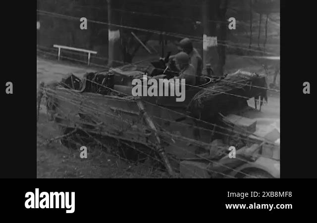 1944 - US soldiers load .50 caliber machine guns mounted on half-track ...