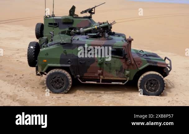Gijon, Spain - May, 24, 2024: An army vehicle of protective coloring ...